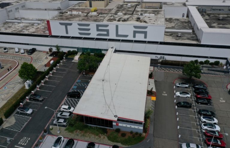 Elon Musk 'restarting' California Tesla factory, defying authorities ...