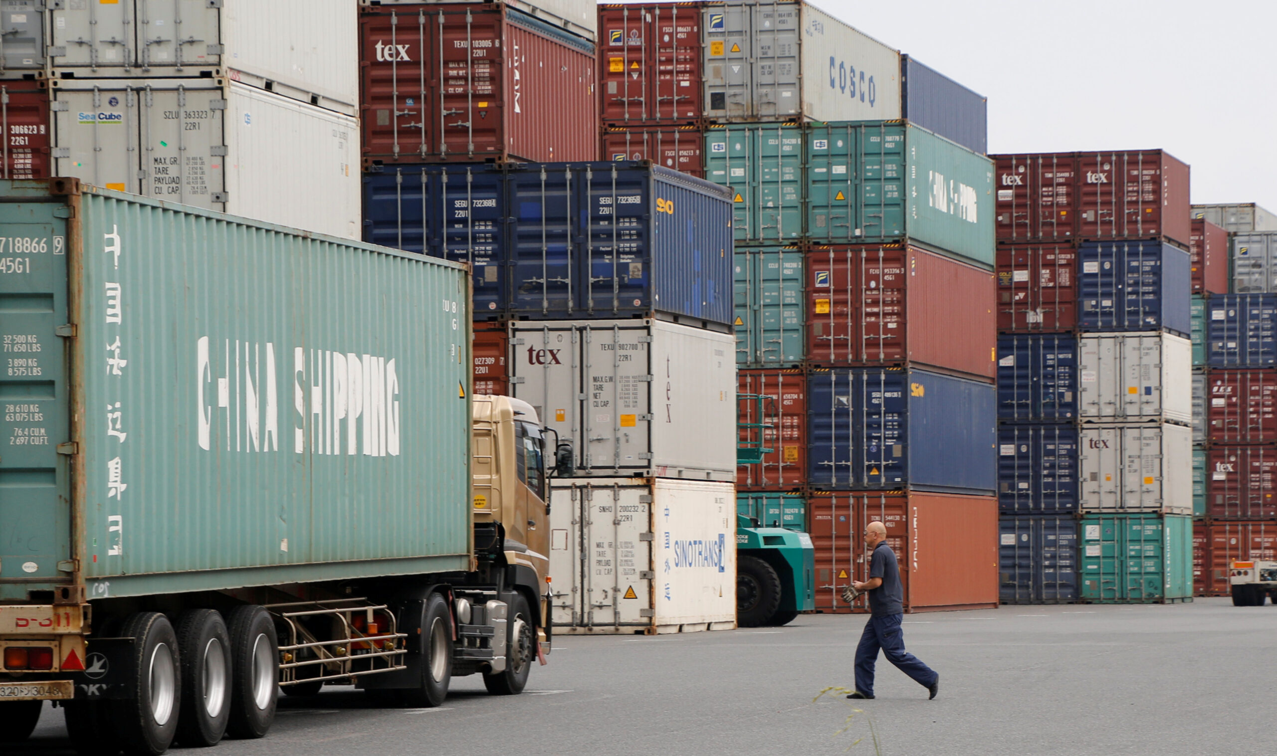 Japan March export growth slows, annual trade deficit widens to record ...